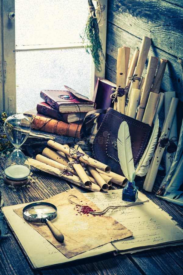 Vintage Witch Workshop with Scrolls and Ingredients Stock Photo - Image ...