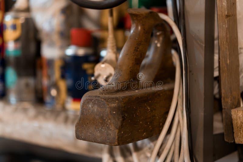 Vintage Wood Hand Plane Hanging in a Rustic Workshop Setting Stock ...