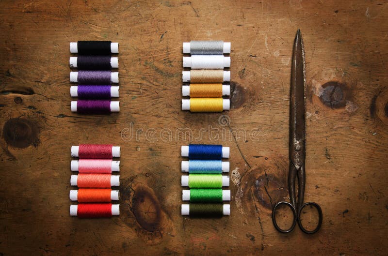 Vintage Wood Table with Spool Colored Threads and Scissor Stock Image ...