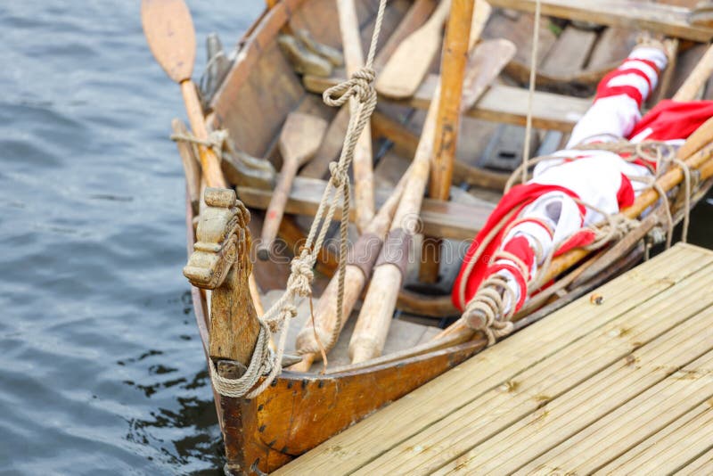 Vintage Wooden Rowboat at the Pier on the Water Stock Photo - Image of ...