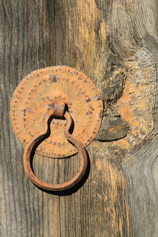 Vintage Wooden Shutter Door with a Door Handle in the Form of a Ring ...