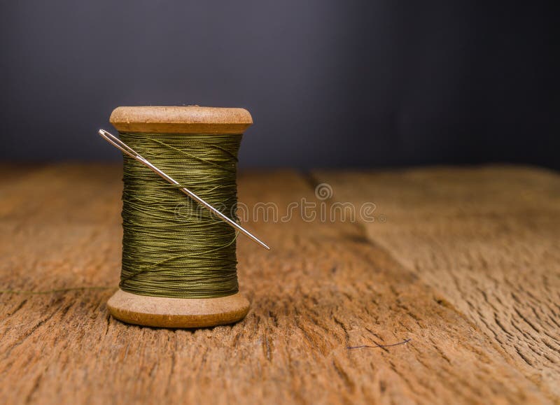 Retro Wooden Spool Thread with Needle Sewing Stock Photo - Image of ...