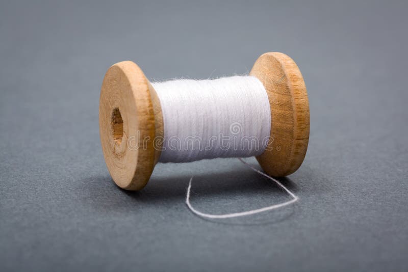 Vintage Wooden Spool of White Sewing Thread Stock Image - Image of ...