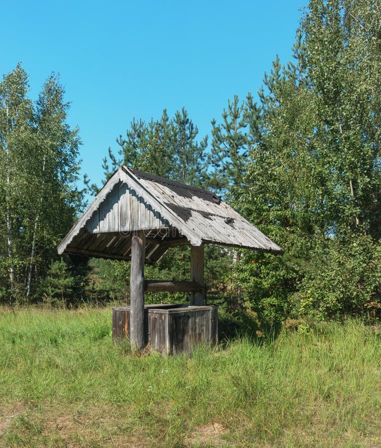 Vintage Wooden Well in Countryside Stock Photo - Image of outdoors ...
