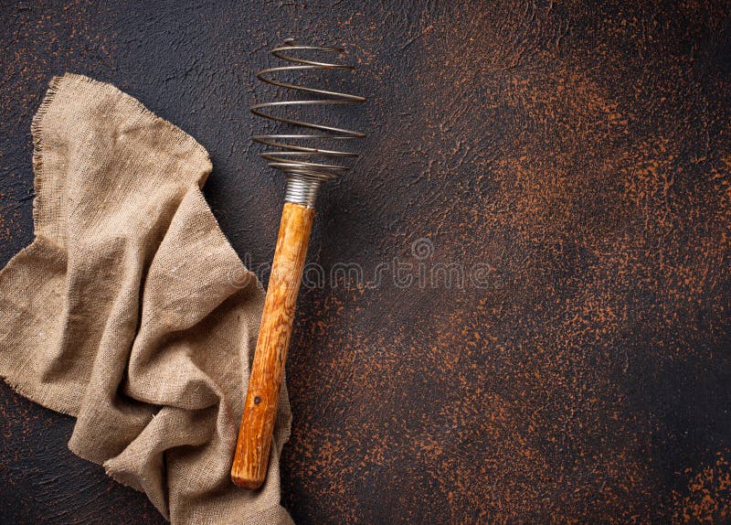 Vintage Wooden Whisk on Old Rusty Background Stock Photo - Image of ...