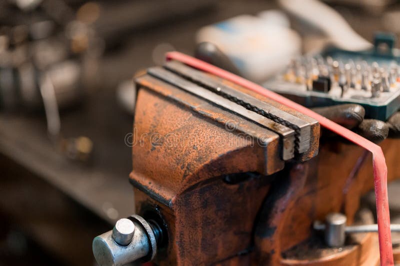 Vintage Workbench Vise with Rusty Patina and Tools in Background Stock ...