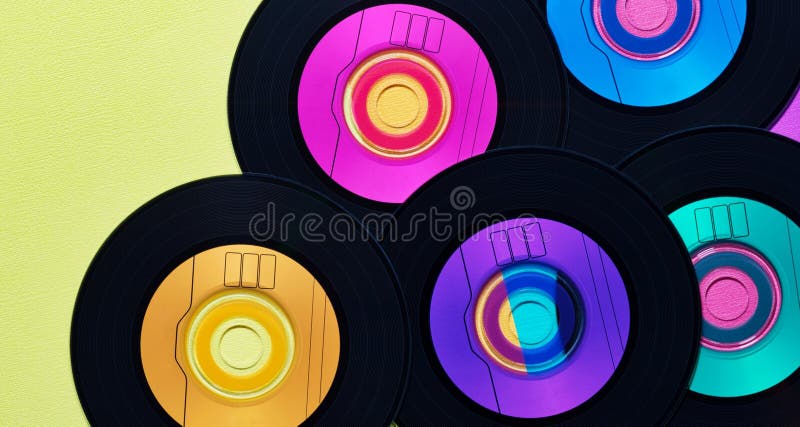 Vinyl CD Discs in Flat Lay Format Displayed on a Yellow Background ...