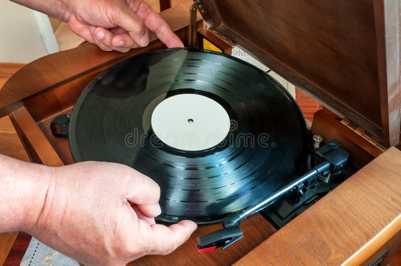 Vinyl disc in hand stock photo. Image of material, elegance - 74055854