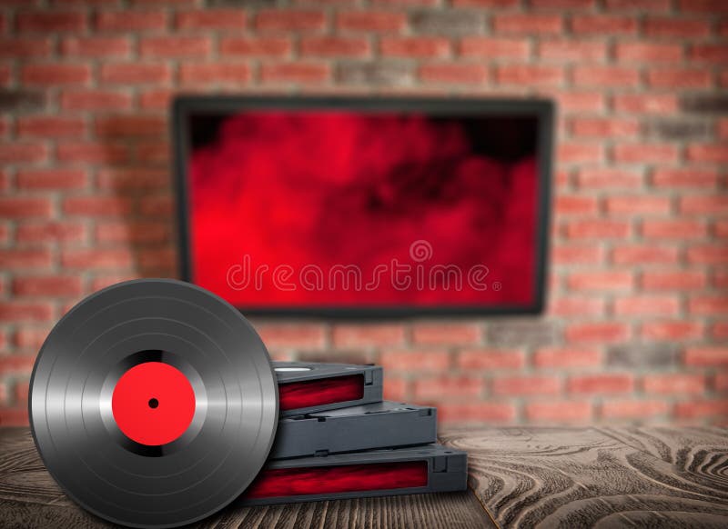Vinyl Disc and Video Cassettes on the Background of the TV Stock Photo ...