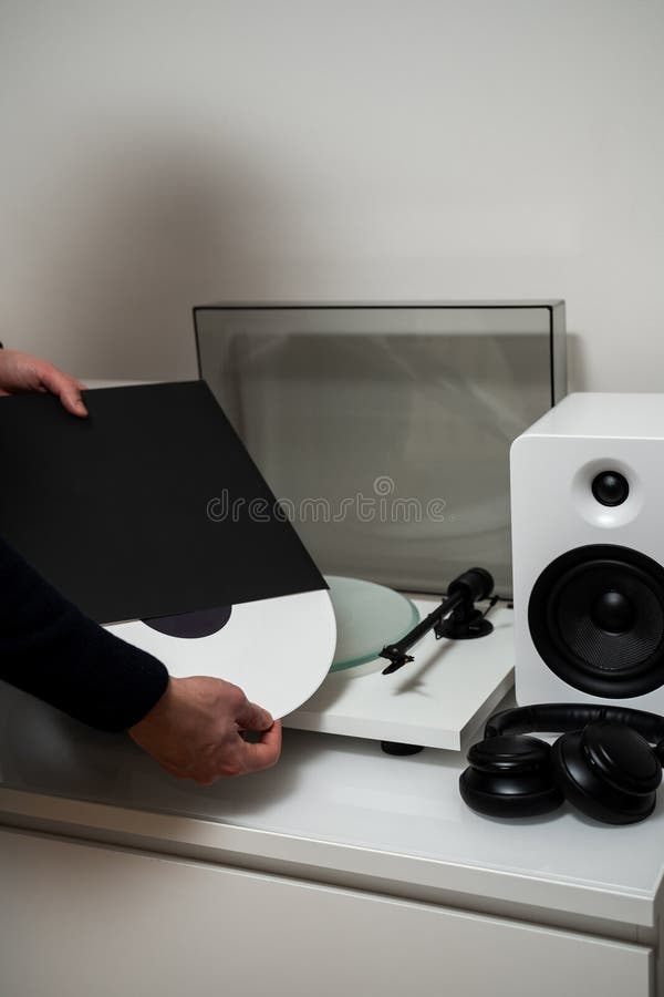 Vinyl LP Tracks with Modern Needle Player. Musician Changes Vinyl ...