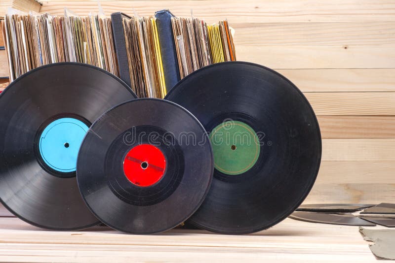 Vinyl Record in Front of a Collection of Albums, Vintage Process. Copy ...