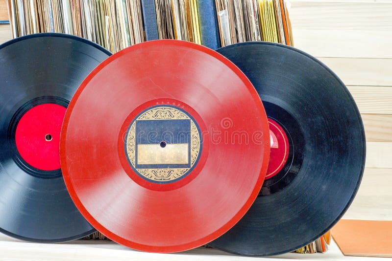 Vinyl Record in Front of a Collection of Albums, Vintage Process. Copy ...