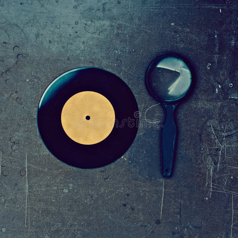 Vinyl record and magnifier stock image. Image of retro - 48620987