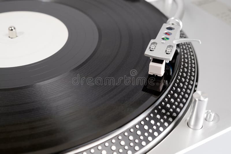 Vinyl record on the player stock image. Image of close - 73229529