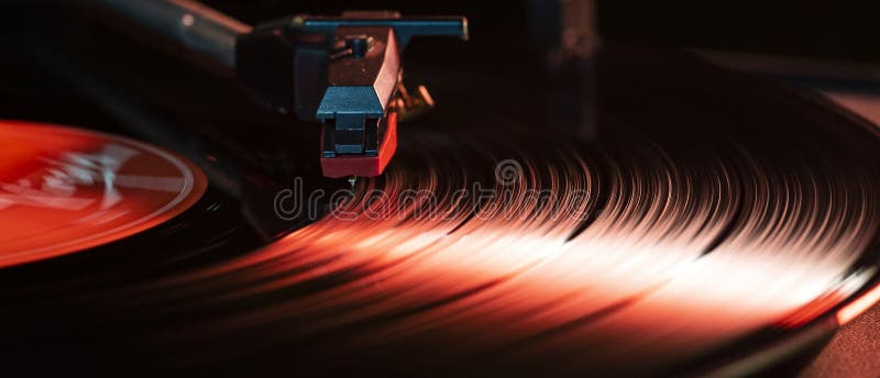 Vinyl Record Playing on Turntable with Red Light Effect Stock ...