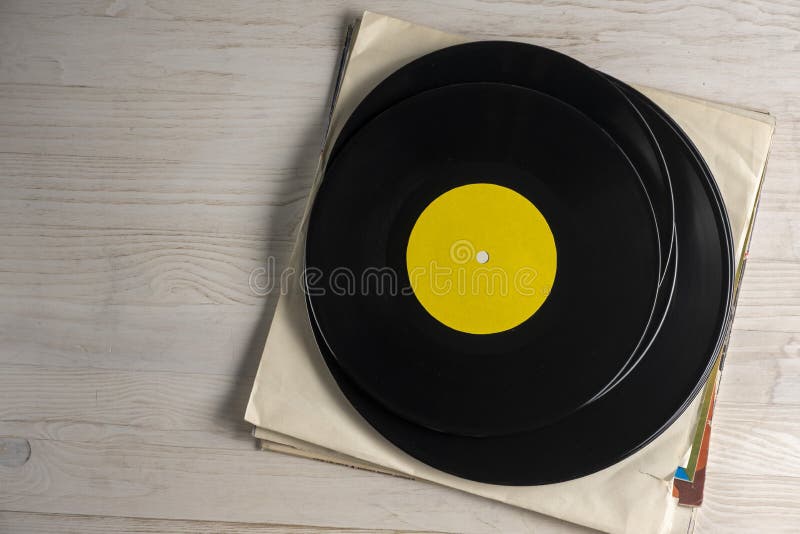 Vinyl Records Stack on a White Wooden Table Stock Image - Image of play ...