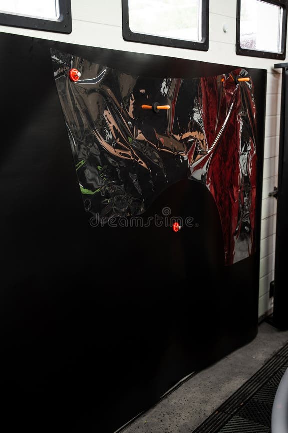 Vinyl Wrap is Manually Cut Using Stencil Over the Film for Precise ...