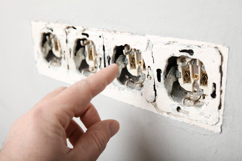 Damaged Socket in the Wall, Dangerous Electricity in the House Stock ...