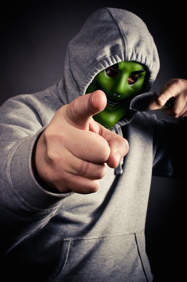 Masked Robber with Gun Aiming into the Camera Stock Photo - Image of ...