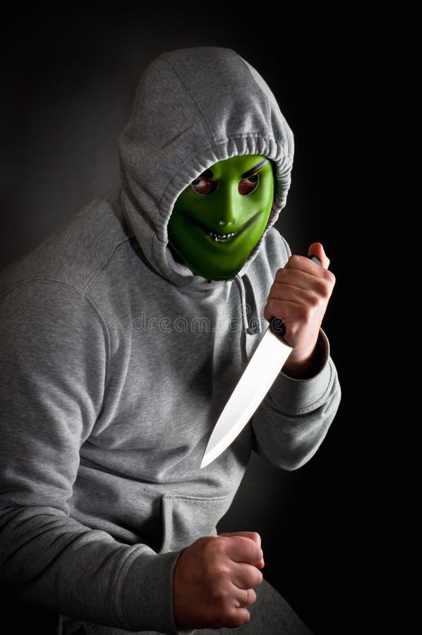 Violent hooded thug stock image. Image of gangster, armed - 35389557