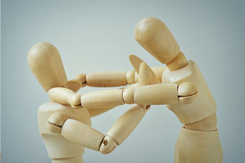 Violent Wooden Mannequin Attacking Weak One - Concept of Violence ...