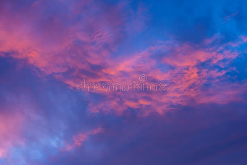 Violet Clouds in a Dramatic Sunset Stock Photo - Image of fluffy ...