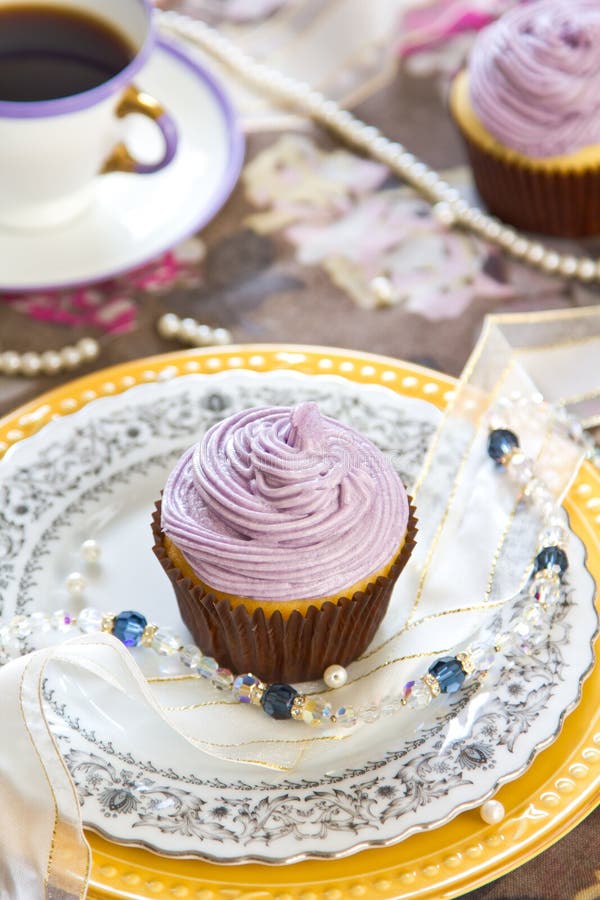Violet cupcake stock photo. Image of frost, baking, butter - 23296288