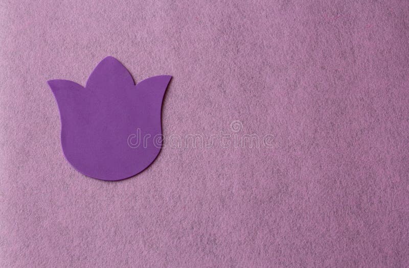 Violet Flower Made of Soft Material on a Pink Rag Background Stock ...
