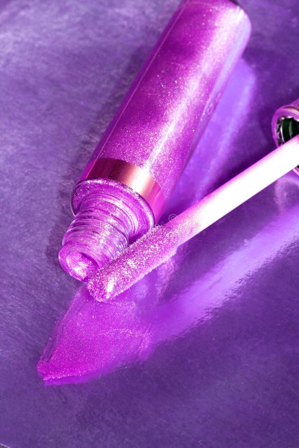 Violet gloss for lips stock image. Image of color, abreast - 3279805