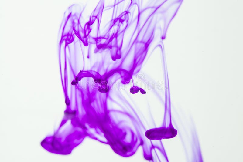 Violet liquid in water stock photo. Image of forms, making - 48801012