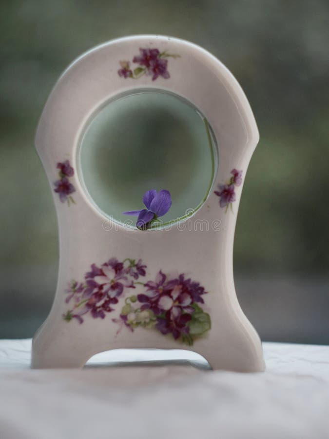 Violet Lying in the Old Clock Stock Photo - Image of place, clock ...