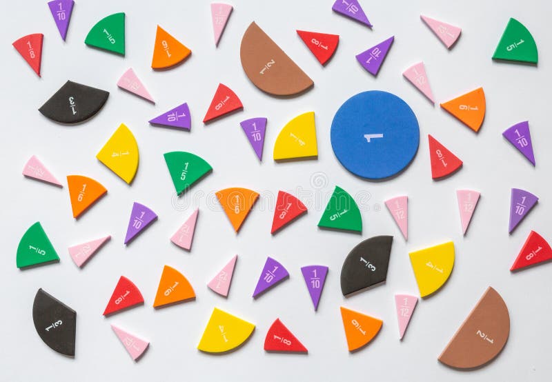 Violet Orange Yellow Pieces of Fractions on the Table. Close Up Math ...
