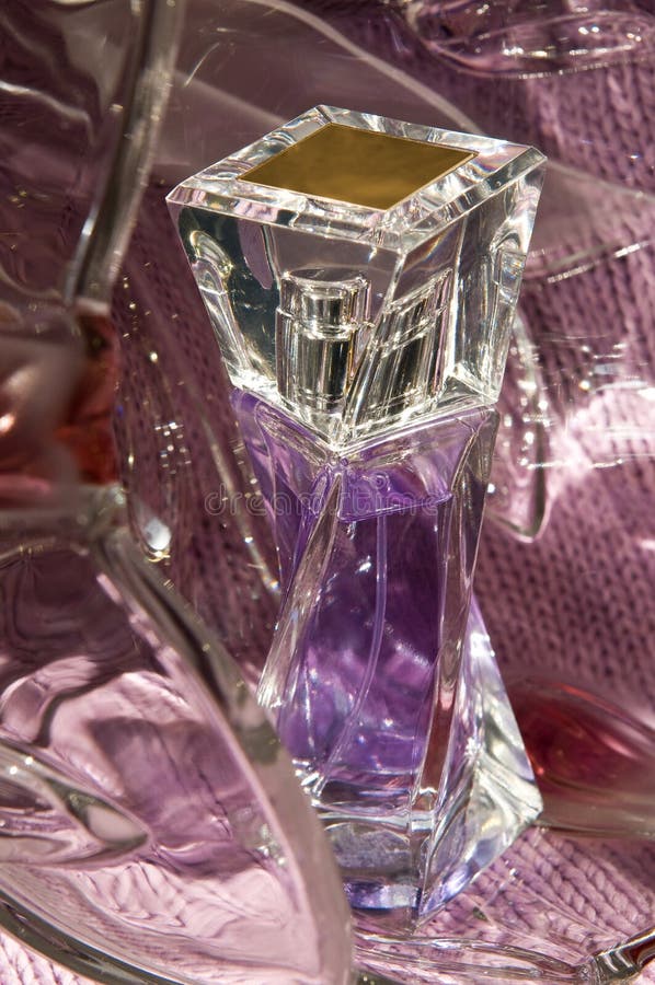 Violet Perfume Bottle with Flowers Around. Lavender and Spring Flower ...