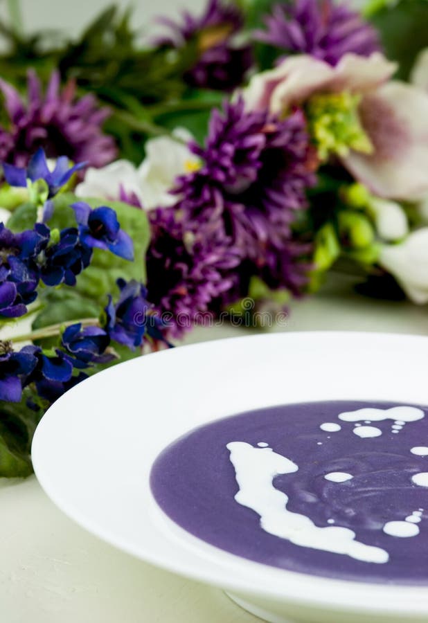 Violet Potato and Leek Soup with Cream Stock Photo - Image of soup ...