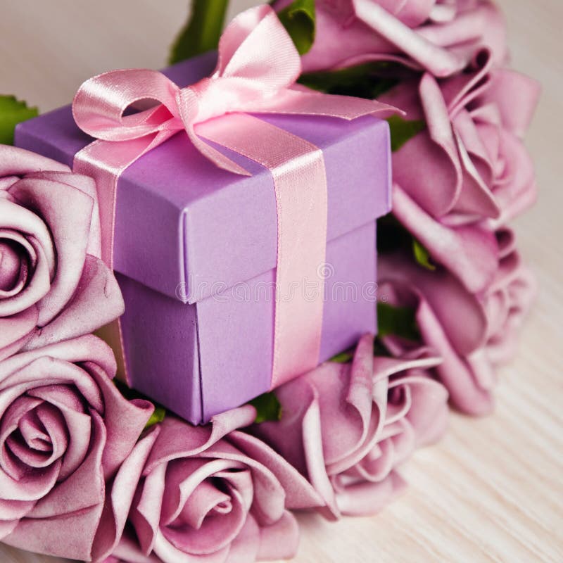Violet roses and gift box stock photo. Image of blossom - 67367794