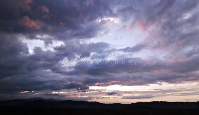Violet sunset with clouds stock image. Image of evening - 120105725