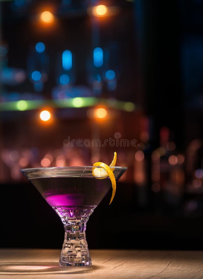 Violet cocktail in a bar stock image. Image of night - 135216467