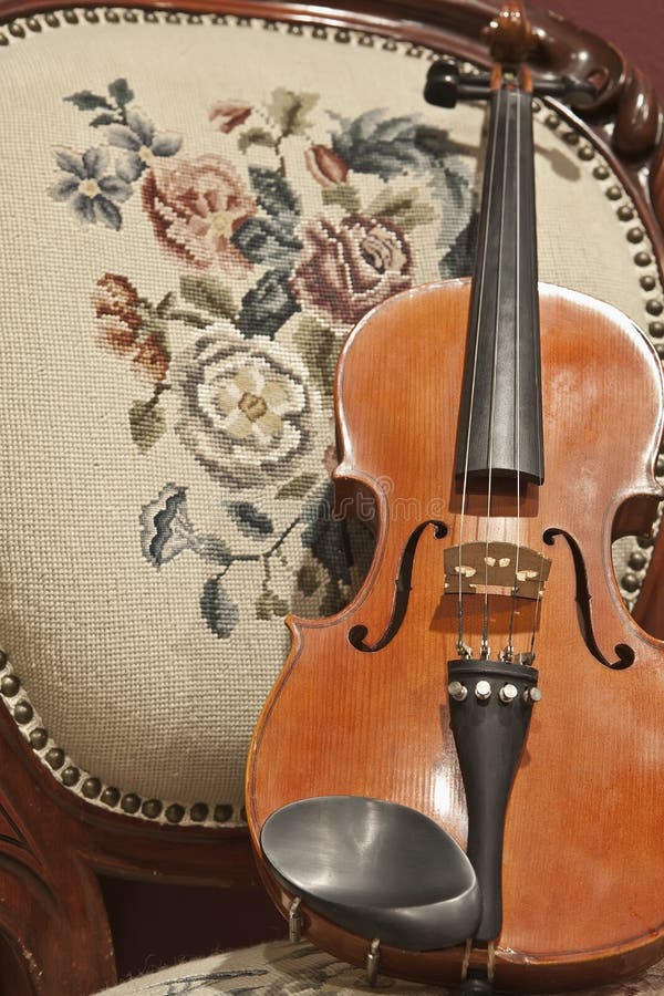 Violin on Antique Chair stock photo. Image of chair, room - 14414106