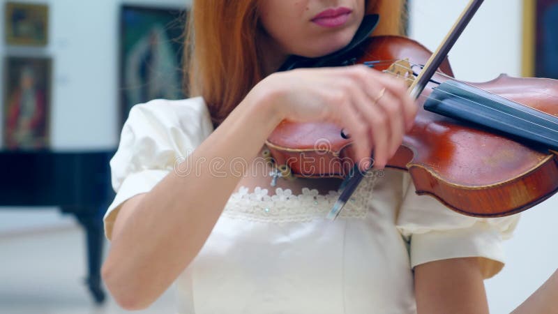 The Violin is Being Played by the Woman Stock Video - Video of concert ...