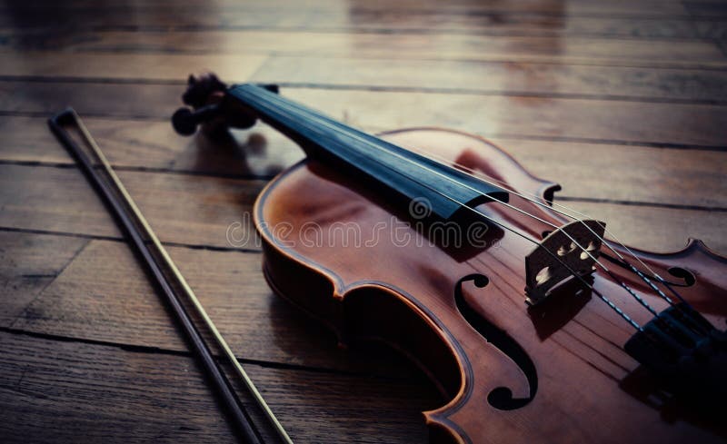 A Violin and its Shadow stock image. Image of table, strings - 59904275