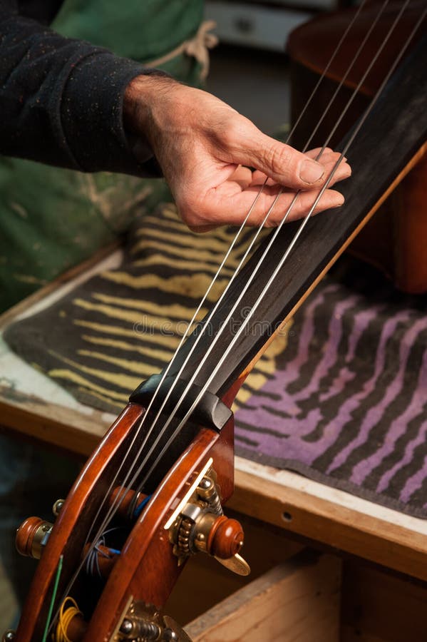 The violin-maker stock photo. Image of instrument, hand - 79006340