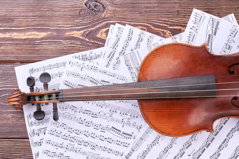 Violin on Musical Notes Sheets. Stock Photo - Image of lesson, page ...