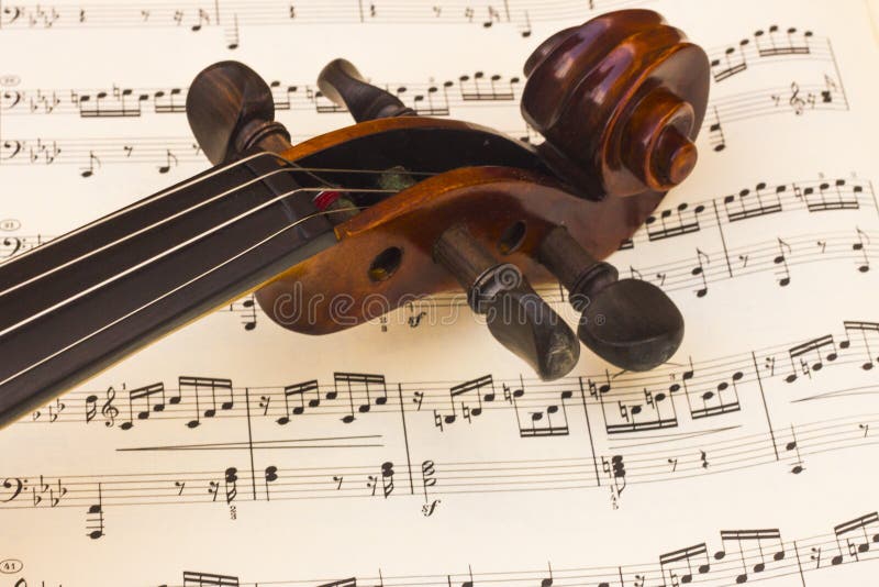 Violin Neck Over a Music Score Sheet Stock Image - Image of document ...
