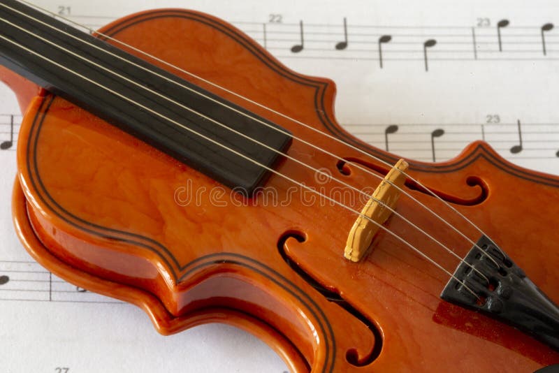 Violin on note paper stock photo. Image of background - 182891856
