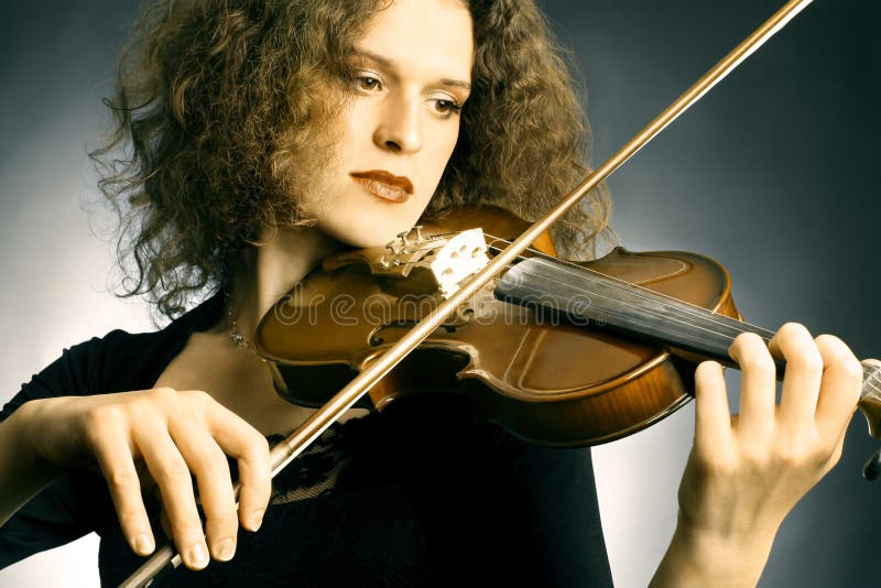 Violin orchestra player stock photo. Image of instrument - 29639624