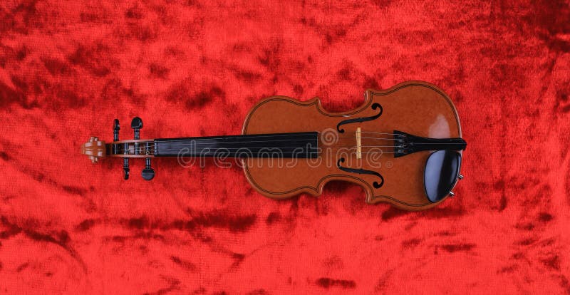 Violin on red velvet stock image. Image of performance - 335260927