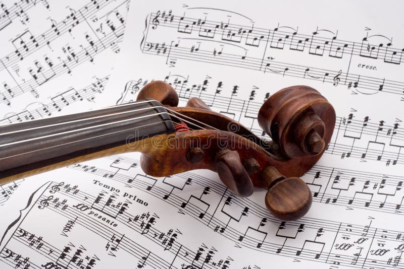 Violin Scroll on Sheet Music Stock Photo - Image of scores, sheet: 6392904