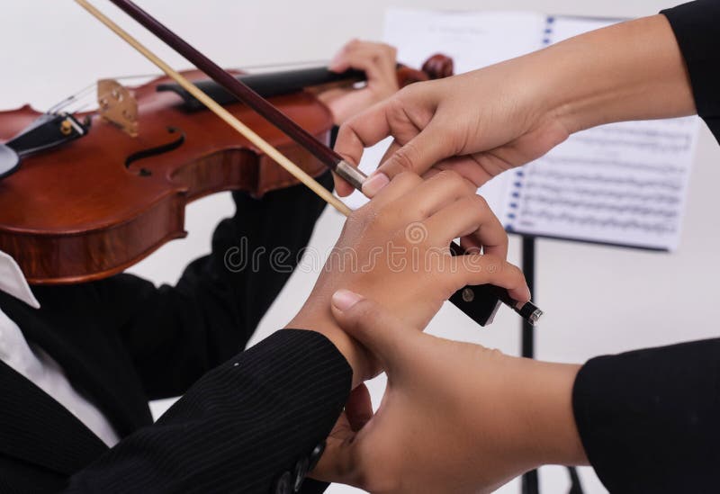 The Violin Teacher Hands is Teaching the Violin Student,by Touch ...