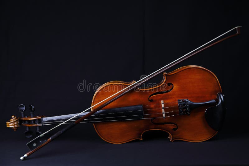 A Violin with Violin Bow on Black Background Stock Image - Image of ...