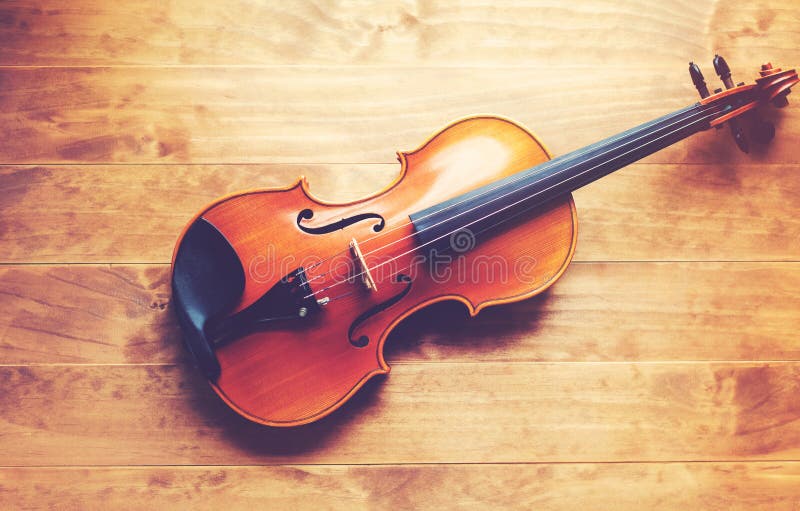 Violin on a Wooden Textured Table Stock Photo - Image of table, wood ...